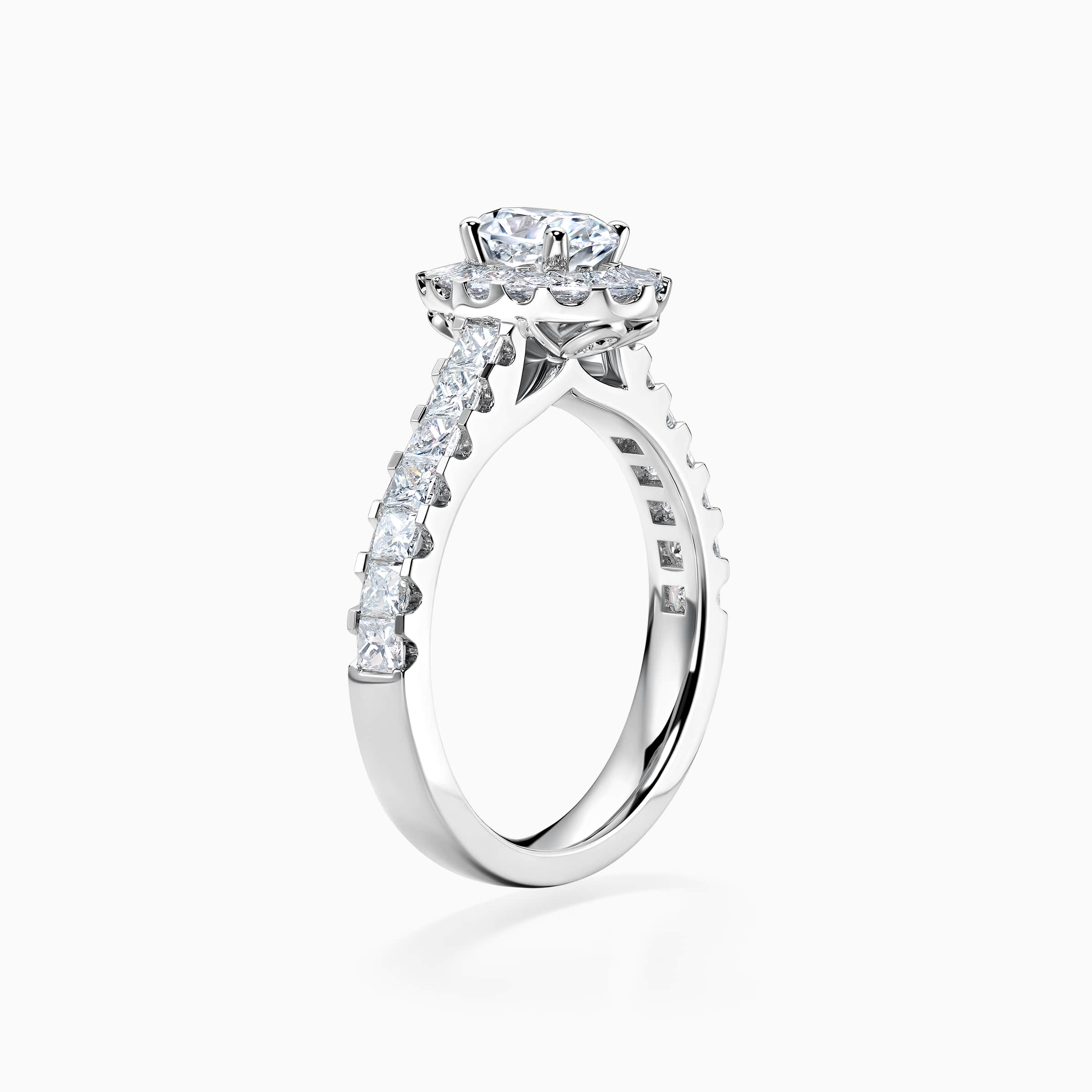 DR Engagement RingsDR TRUE LOVE Oval-cut Halo Pavé Engagement RingA man ...